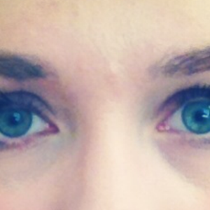 one eye slightly closed